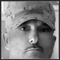 Portrait of lion relaxing on ground | ID: 140381538